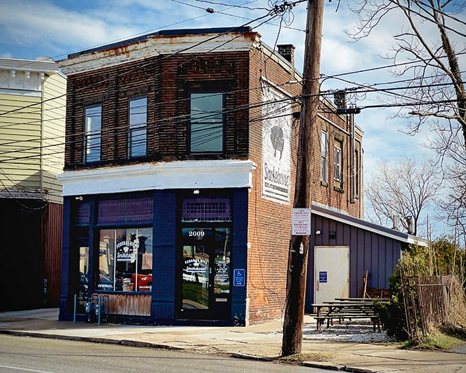 The writing's on the wall&mdash;literally! Federal Hill Smokehouse's rustic brick exterior proudly displays its mission with a simple pig silhouette that promises smoky delights within.