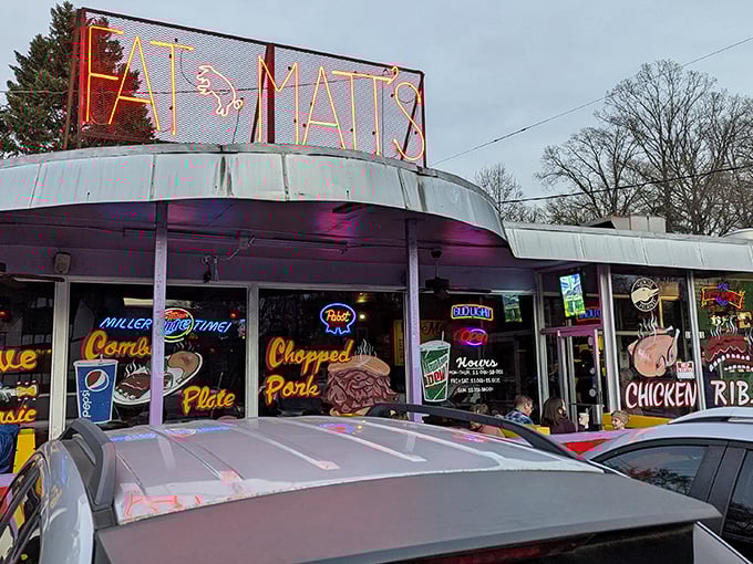 That neon sign isn't just a logo&mdash;it's Atlanta's bat signal for barbecue lovers. Fat Matt's glows like a beacon of smoky promise.