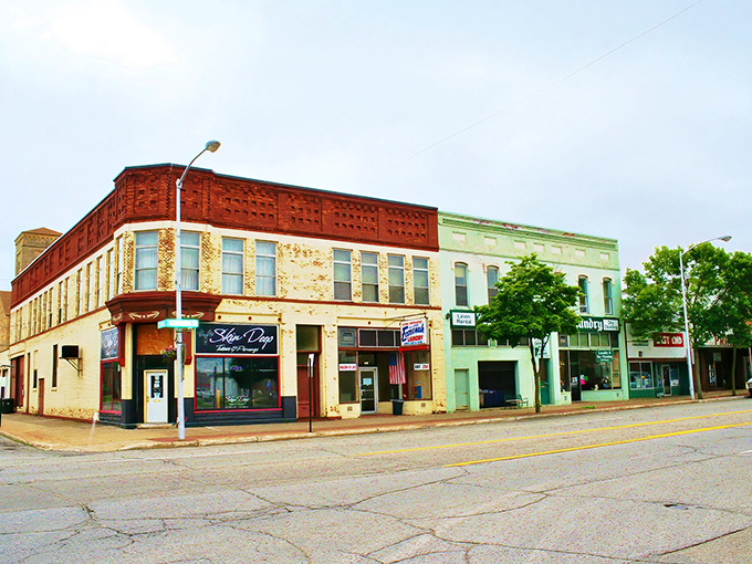 Escanaba's iconic teal water tower stands sentinel over tree-lined streets and modest homes&mdash;small-town America with waterfront views that million-dollar suburbs would envy.