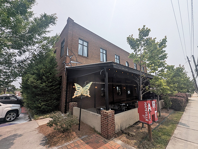 The golden butterfly beckons from this unassuming brick building, like a secret handshake for those in-the-know about Hapeville's hidden gem.