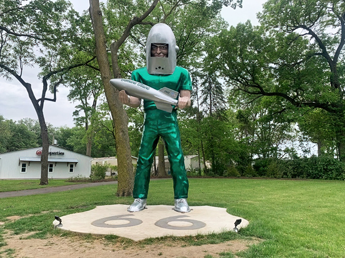 Standing tall in his residential neighborhood, the Gemini Giant proves that sometimes the best neighbors come in fiberglass.