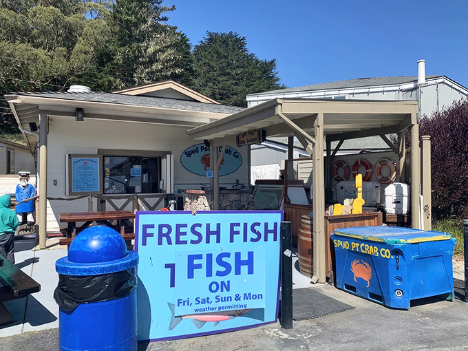 The unassuming exterior of Spud Point Crab Company proves once again that the best seafood often comes from places where boats outnumber parking spots.