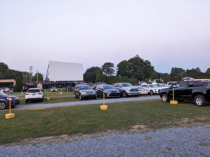 Twilight magic unfolds as cars gather beneath Pennsylvania's oldest continuously operating silver screen. Cinema under the stars never gets old.