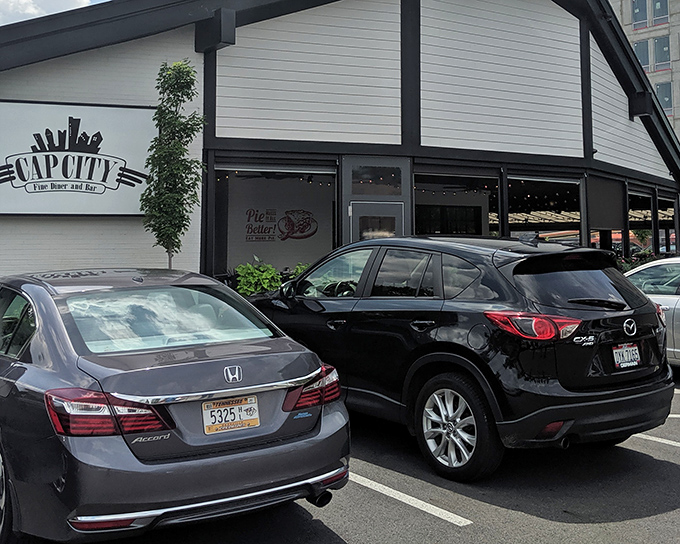 The unassuming exterior of Cap City Fine Diner & Bar hides culinary treasures within, like finding a diamond in your grandmother's cookie jar.