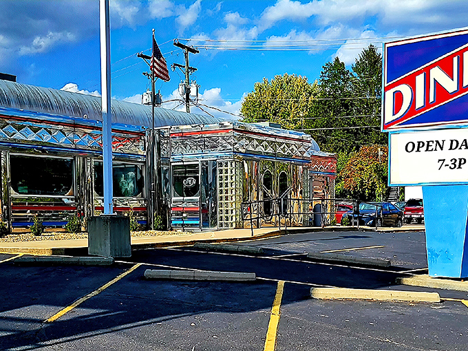 The gleaming stainless steel exterior of Maddy's Diner 23 shines like a beacon of hope for hungry travelers. Classic Americana at its finest.