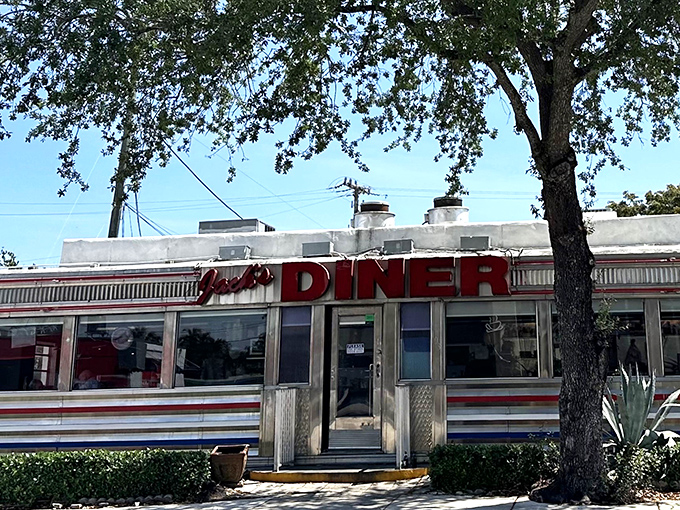 Classic diner architecture meets Florida sunshine in this gleaming testament to breakfast perfection.