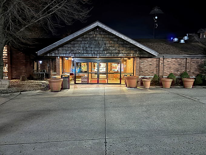 The rustic wooden shingles and warm brick exterior welcome hungry travelers like an old friend waiting with open arms.