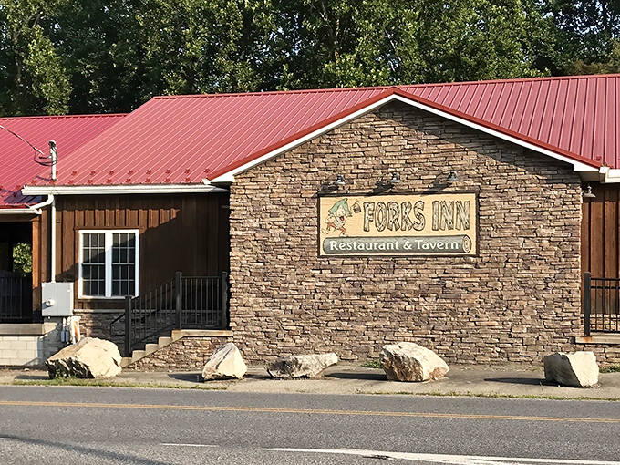 The wooden facade of Fork's Inn stands like a culinary speakeasy in Ligonier, promising treasures that belie its humble exterior.