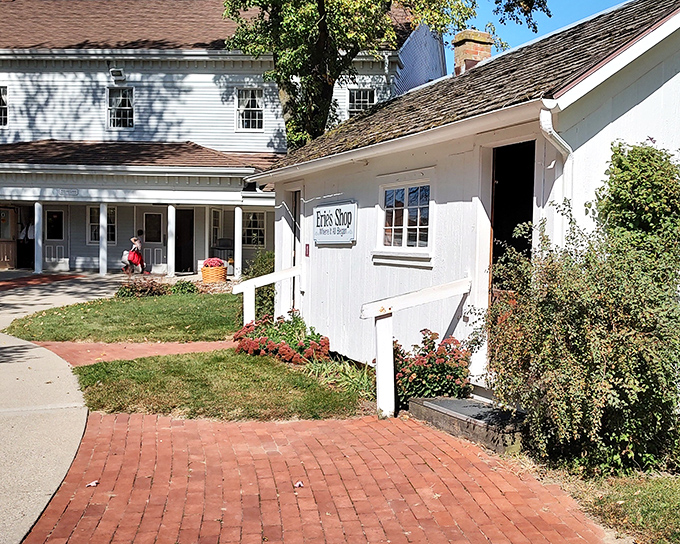 The charming exterior of Sauder Village welcomes visitors with classic white buildings and brick pathways&mdash;rural Ohio's version of a time machine.