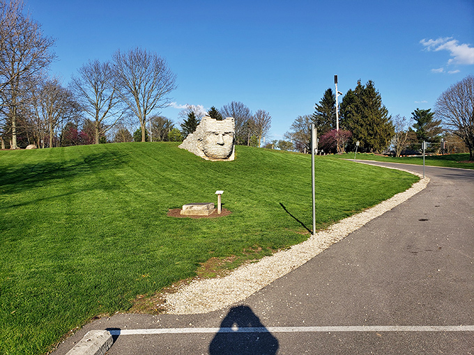 The iconic Chief Leatherlips monument watches over Scioto Park like a stone sentinel with the world's most impressive poker face. 