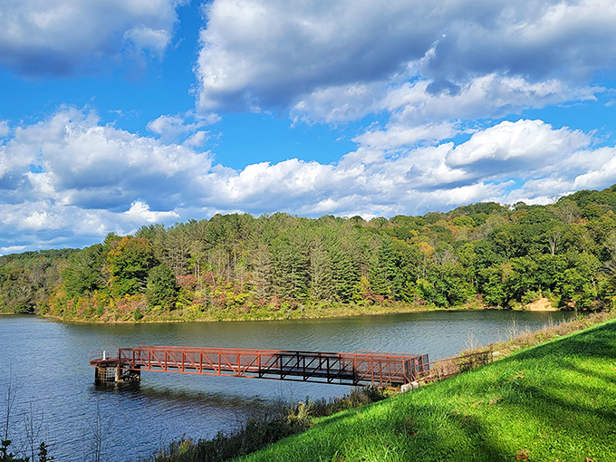 Nature's masterpiece unfolds where rolling hills meet pristine waters in southeastern Ohio's hidden treasure.