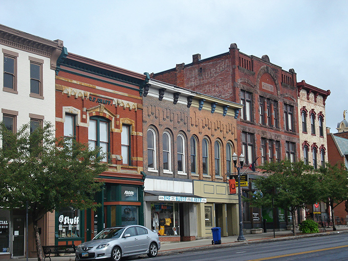 Downtown Delaware's historic brick buildings stand like old friends sharing stories across generations, their warm red facades glowing in the afternoon sun.