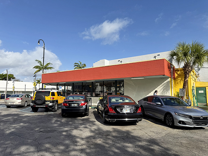 That coral-red facade isn't just a building&mdash;it's a beacon of breakfast hope in Miami's sea of trendy eateries.
