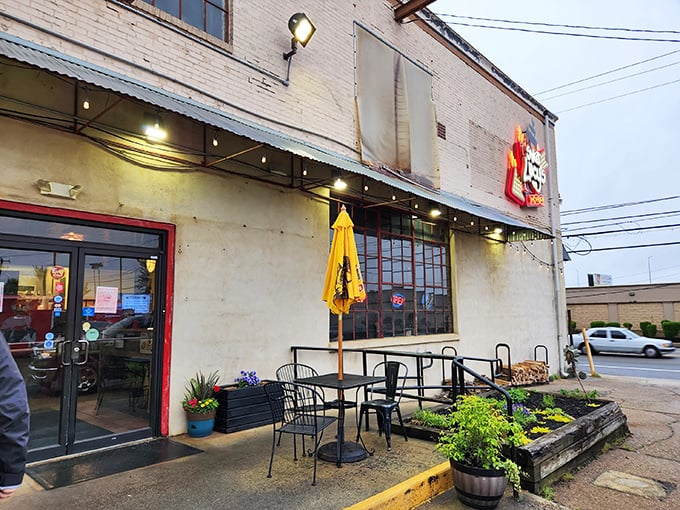 The unassuming exterior of Sweet Lucy's Smokehouse hides a temple of barbecue brilliance within. Like finding a Picasso at a yard sale.