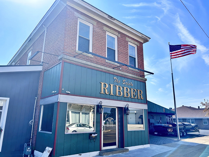 The Scioto Ribber stands proudly in Portsmouth, its brick-and-green exterior and waving flag promising carnivorous delights that have made it an Ohio legend.