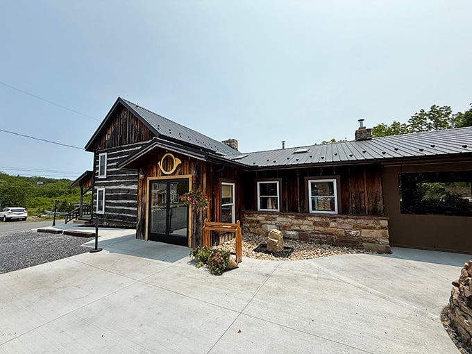 This isn't just a restaurant, it's a time machine. Horn O Plenty's log cabin exterior blends pioneer charm with modern hospitality, complete with colorful flower baskets that practically sing "welcome."