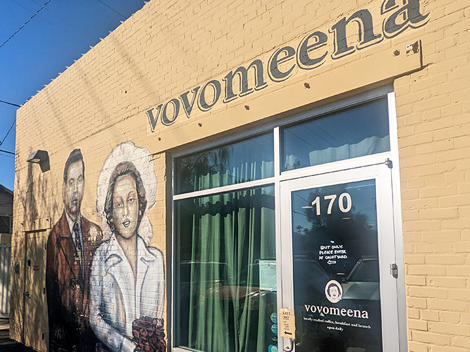 The bright yellow exterior of Vovomeena features a vintage-style mural that practically screams, "Stop your car immediately and get breakfast!"