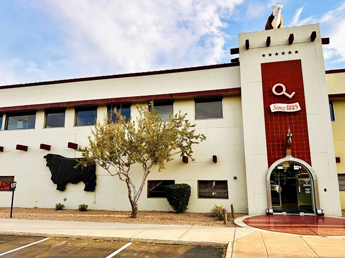 The iconic exterior of The Stockyards stands as a monument to Arizona's cattle heritage, complete with that unmistakable bull silhouette watching over hungry visitors.