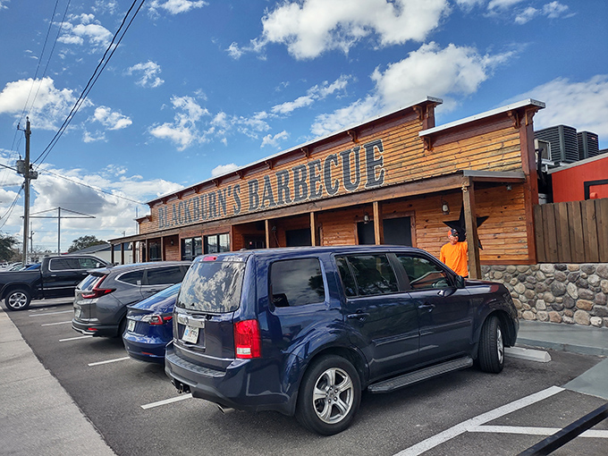 The rustic wooden facade of Blackburn's Barbecue stands like a beacon of smoky promise under Florida's blue skies, beckoning hungry travelers with its no-nonsense charm.