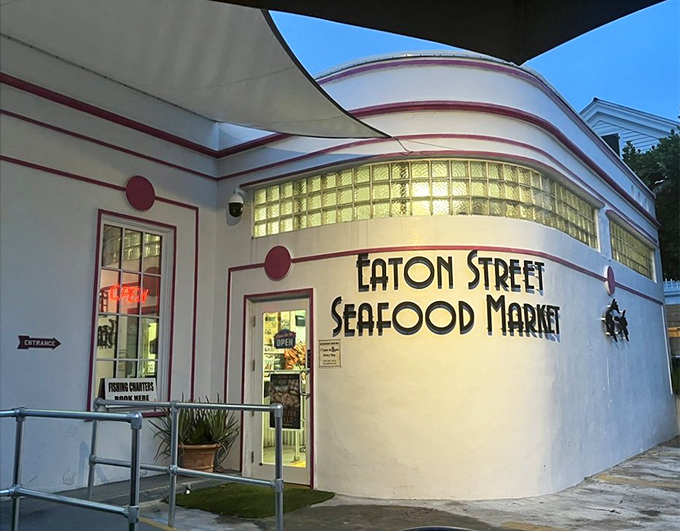 The pink and white Art Deco facade of Eaton Street Seafood Market isn't just eye-catching—it's a beacon for seafood lovers hiding in plain sight on a Key West corner.
