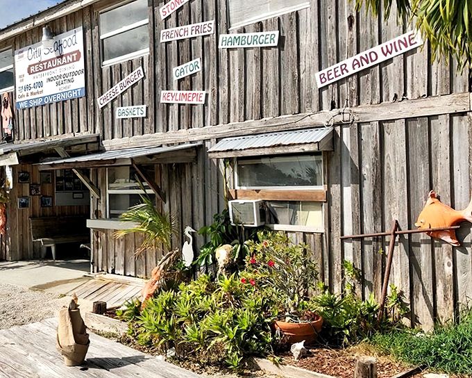 The weathered wooden exterior of City Seafood screams "authentic Florida" louder than a pelican at feeding time. Hand-painted signs promise culinary treasures within.