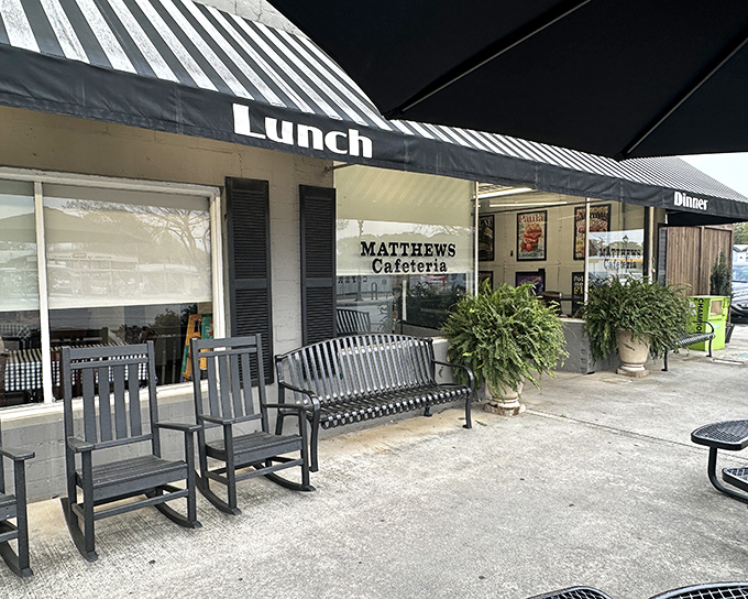 The unassuming storefront of Matthews Cafeteria beckons with Southern charm, rocking chairs patiently waiting for post-meal contemplation.