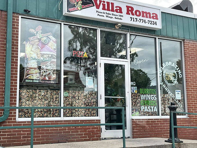 That unassuming brick facade hides culinary treasures that would make your Italian grandmother weep with joy.