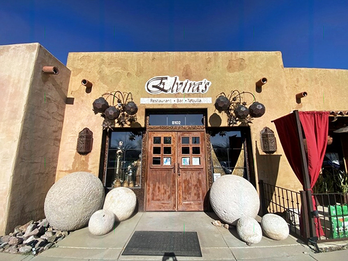 The adobe-style entrance to Elvira's welcomes you with rustic wooden doors and dramatic metal ornaments&mdash;like stepping into a secret Mexican courtyard.