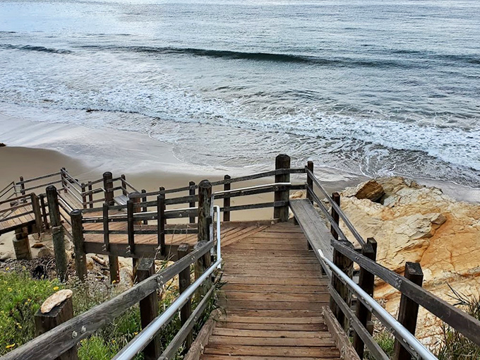 The wooden staircase at El Capit&aacute;n beckons like a portal to paradise. Each step brings you closer to that perfect blend of sand, sea, and serenity.