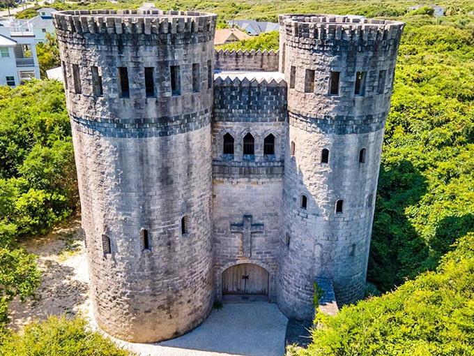 Like a medieval mirage rising from the Florida greenery, Castle Otttis stands proudly with its twin towers reaching skyward, defying both time and geography.