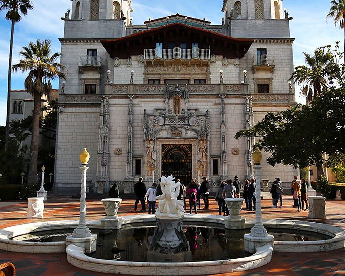 The grand entrance to Hearst Castle feels like stepping into a European fantasy, complete with ornate fountain and Mediterranean architecture that whispers "you're not in California anymore."
