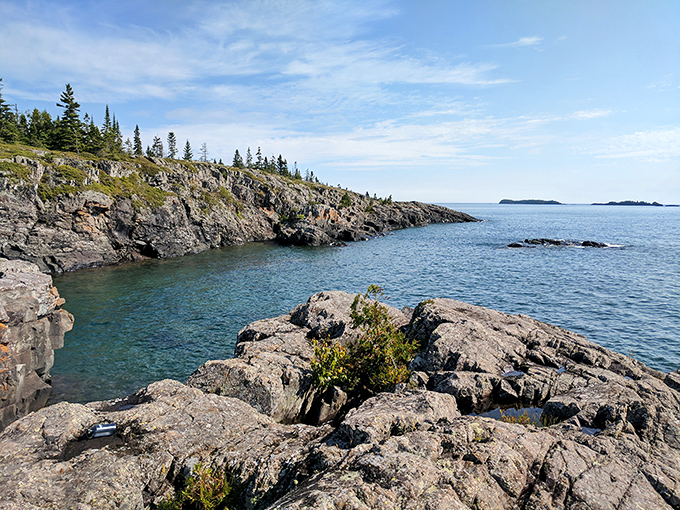 Nature's perfect postcard doesn't exi&mdash; Oh wait, it does! The pristine shoreline of Isle Royale where Lake Superior's crystal waters meet ancient bedrock and evergreen sentinels.