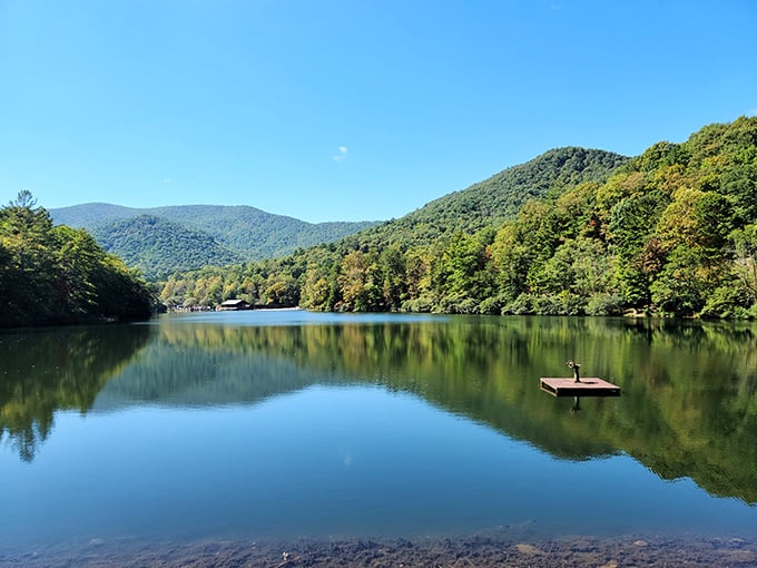 Mirror, mirror on the lake! Nature's own infinity pool reflects the Blue Ridge Mountains in a display that beats any screensaver.