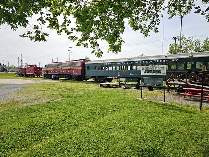 The crimson and gold locomotive sits majestically against the blue Missouri sky, like a time machine ready to whisk you back to the golden age of rail travel. 