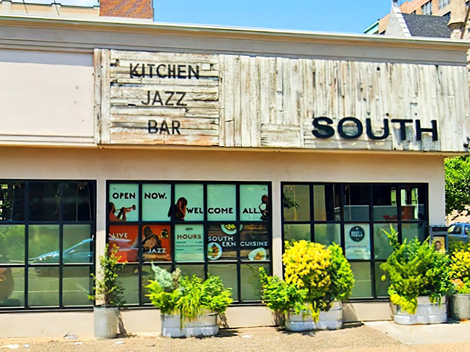 SOUTH's exterior speaks volumes with its rustic wooden signage&mdash;"KITCHEN, JAZZ, BAR"&mdash;like a delicious haiku promising good times ahead.