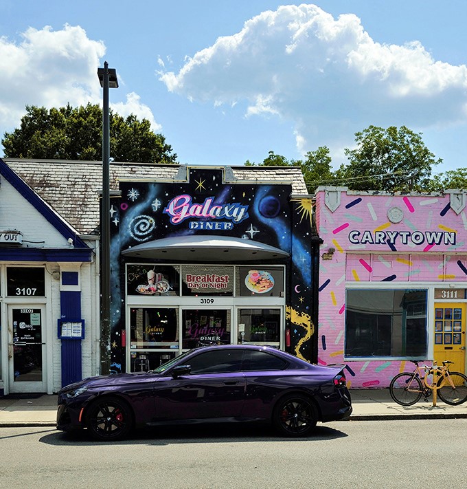 The cosmic facade of Galaxy Diner stands out in Richmond's Carytown district like a neon beacon for hungry earthlings seeking interstellar comfort food.