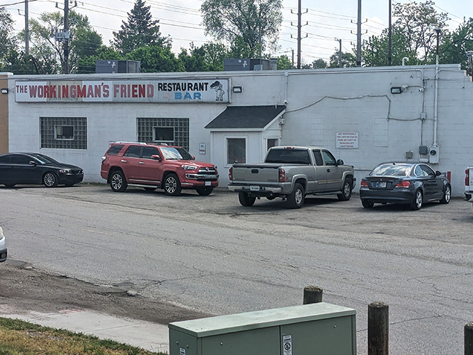 The unassuming exterior promises no frills, just thrills for your taste buds. This weathered sign has welcomed hungry Hoosiers for generations.