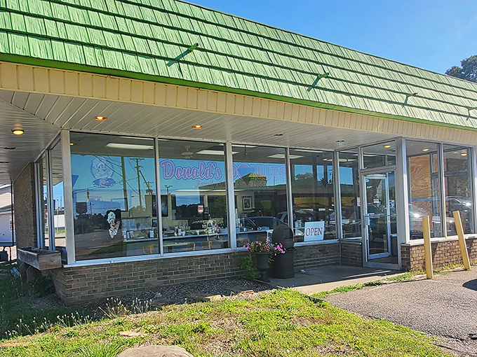 The iconic green roof of Donald's Donuts stands as Zanesville's beacon of breakfast bliss, promising sweet salvation to early risers and sugar enthusiasts alike.