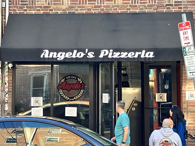 The pilgrimage begins! Angelo's modest brick storefront with its simple black awning has become hallowed ground for sandwich aficionados across Pennsylvania.