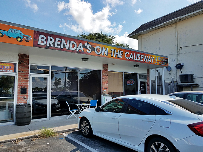 The unassuming exterior of Brenda's On the Causeway stands like a breakfast beacon along Dunedin's waterfront, promising simple pleasures within.