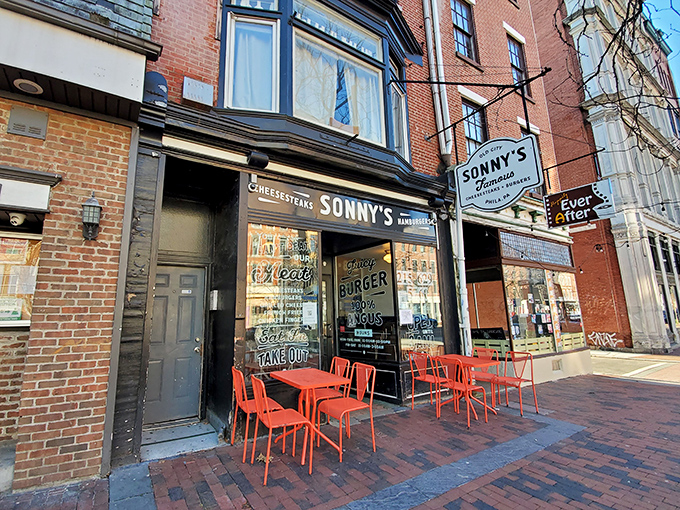 The brick-and-mortar temple of cheesesteak worship in Old City, where those bright orange chairs practically scream "sit here and prepare for deliciousness!"