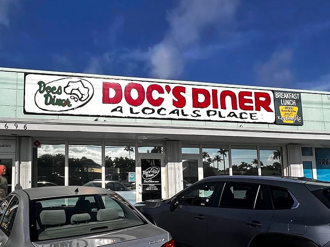 Where "A Local's Place" isn't just a slogan but a promise. Doc's Diner stands proudly against that brilliant Florida sky, beckoning hungry travelers with honest food and zero pretension.
