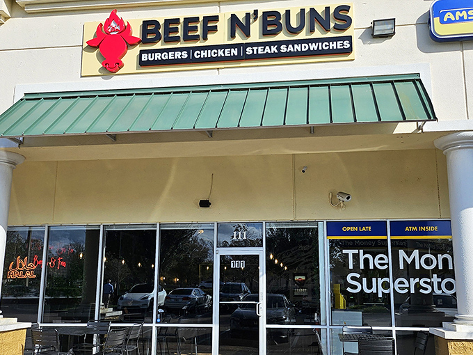 The red bull logo winks at hungry passersby, promising a burger experience worth crossing county lines for. No fairy dust needed.