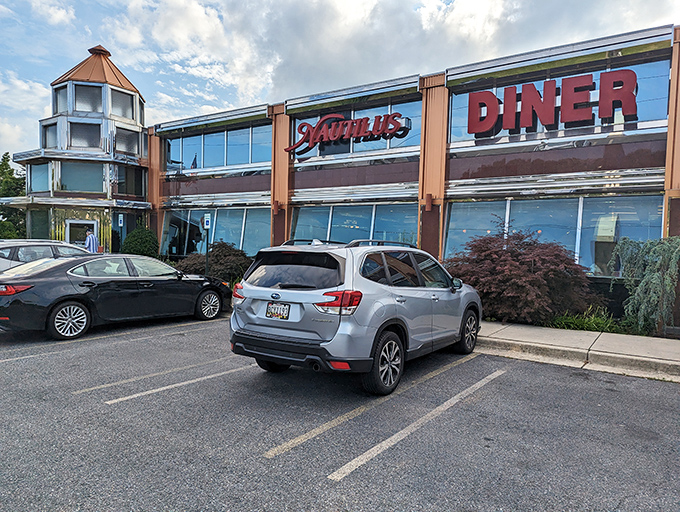 The gleaming chrome exterior of Nautilus Diner stands like a beacon of breakfast hope along Route 3, promising pancake perfection within.