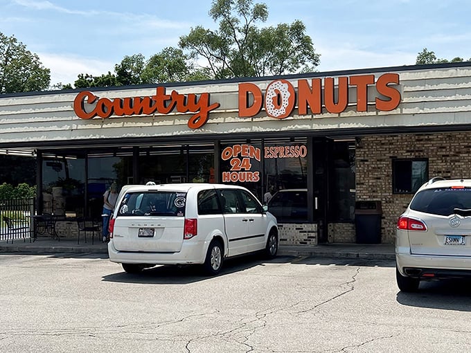 That orange signage isn't just advertising &ndash; it's a beacon calling donut lovers home to paradise.