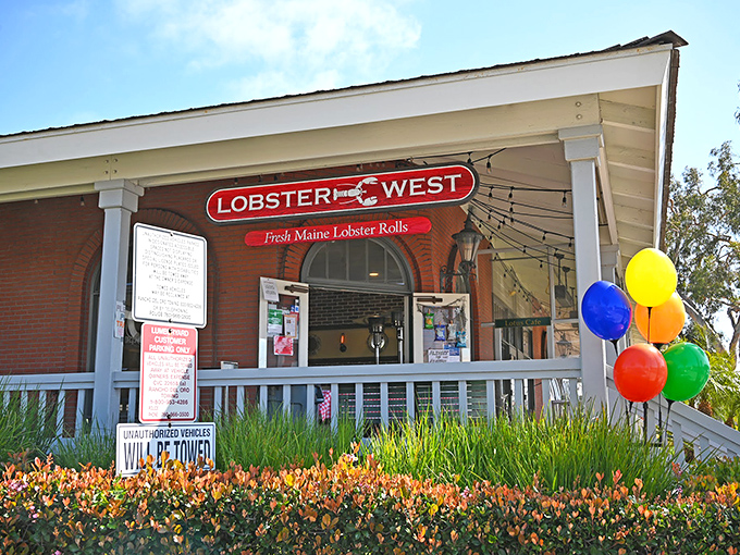 The unassuming storefront of Lobster West beckons seafood lovers with its simple charm and promise of authentic Maine flavors in sunny Encinitas.