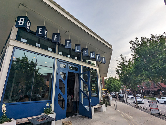 BeetleCat's striking blue exterior stands out in Inman Park like a maritime beacon, promising seafood treasures within its nautical-inspired walls.