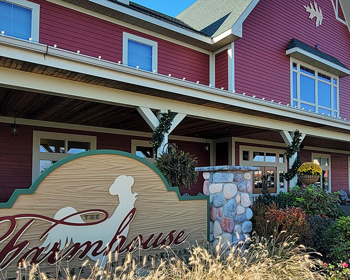 The iconic red barn exterior of Farmhouse Restaurant stands as a beacon for hungry travelers, promising farm-fresh delights within its welcoming walls.