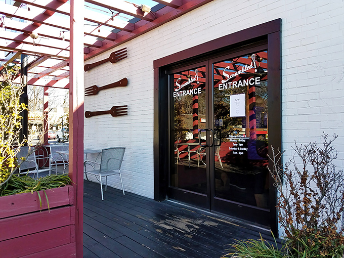 The vine-draped porch of Scrambled welcomes you like a Southern grandmother's hug&mdash;rustic, charming, and promising something delicious inside.