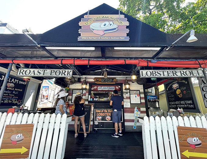 The line forms early at DJ's Clam Shack, where Key West visitors patiently wait for lobster roll nirvana under the tropical sun.